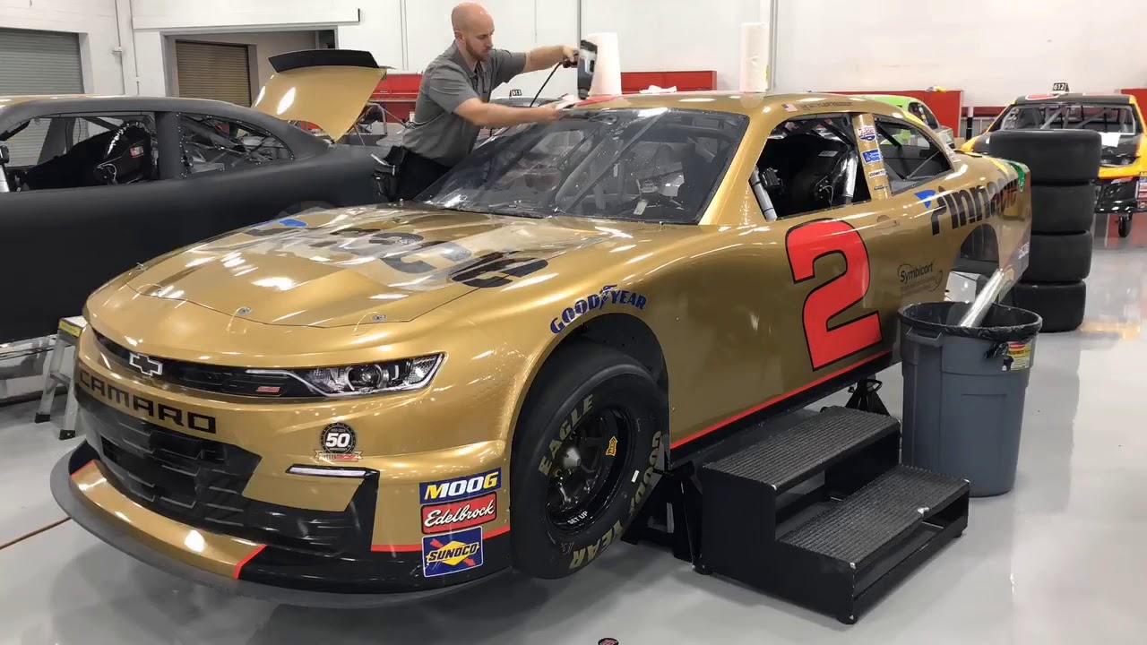 Installing Racing Tear-Offs for NASCAR Team - YouTube