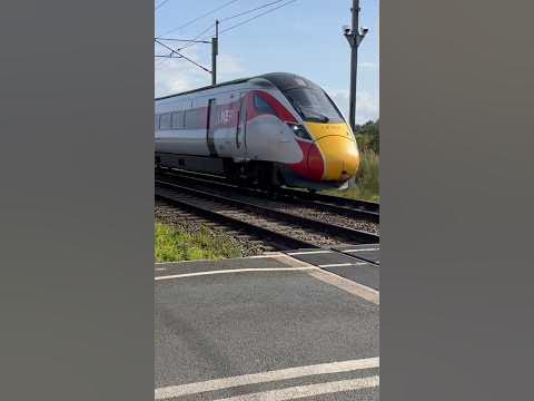 LNER passing Sutton & Barnby LC - YouTube