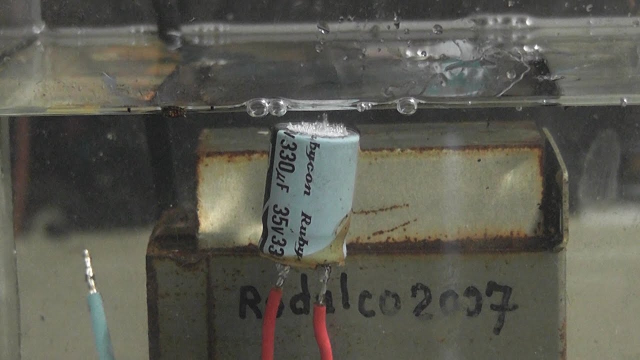 Unvented Capacitor explodes in Mineral Oil - YouTube