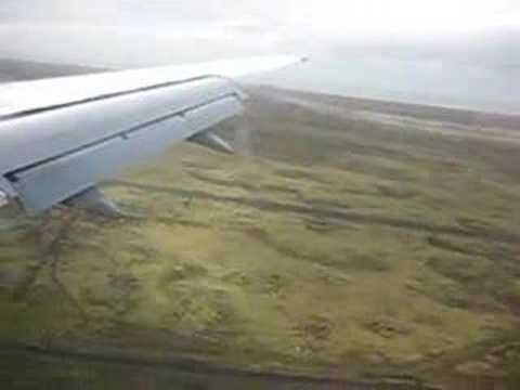 Landing in Keflavik (note flap vortex) - YouTube