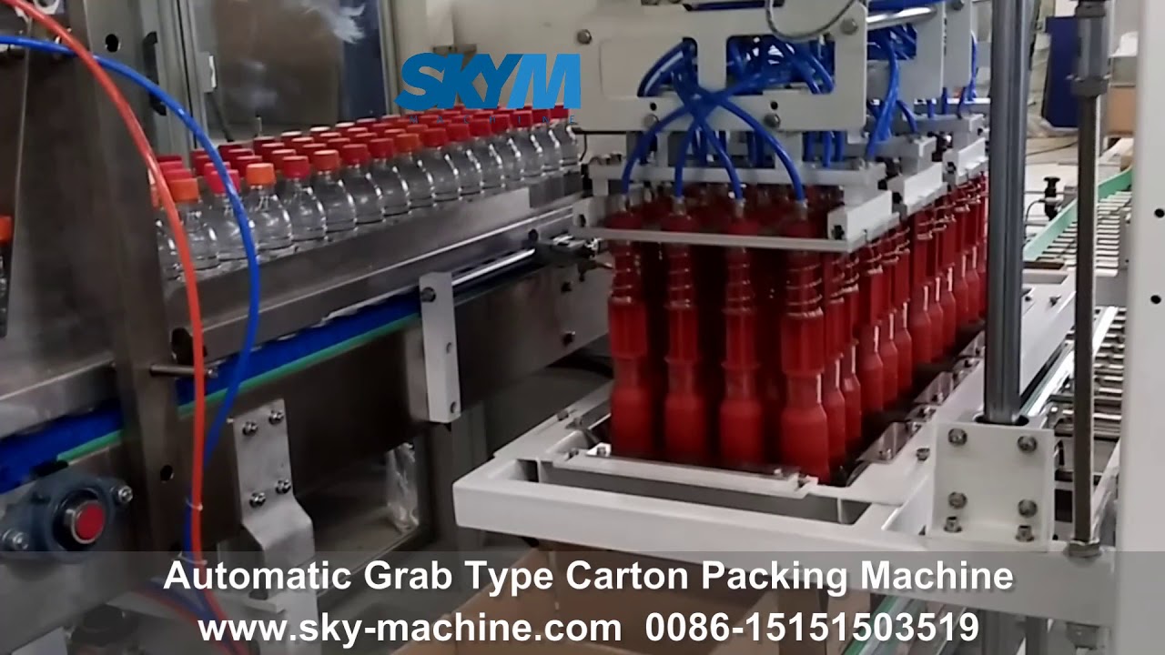 Automatic Grab type carton packing machine - YouTube