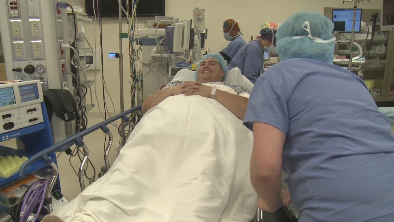 Surgery helps football coach - YouTube