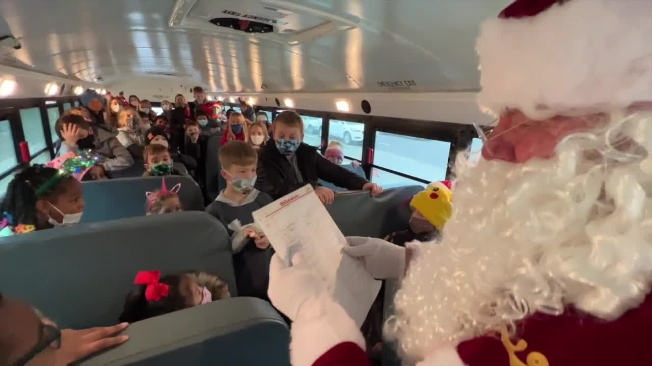 Northville bus driver dresses as Santa, surprises students with gifts ...