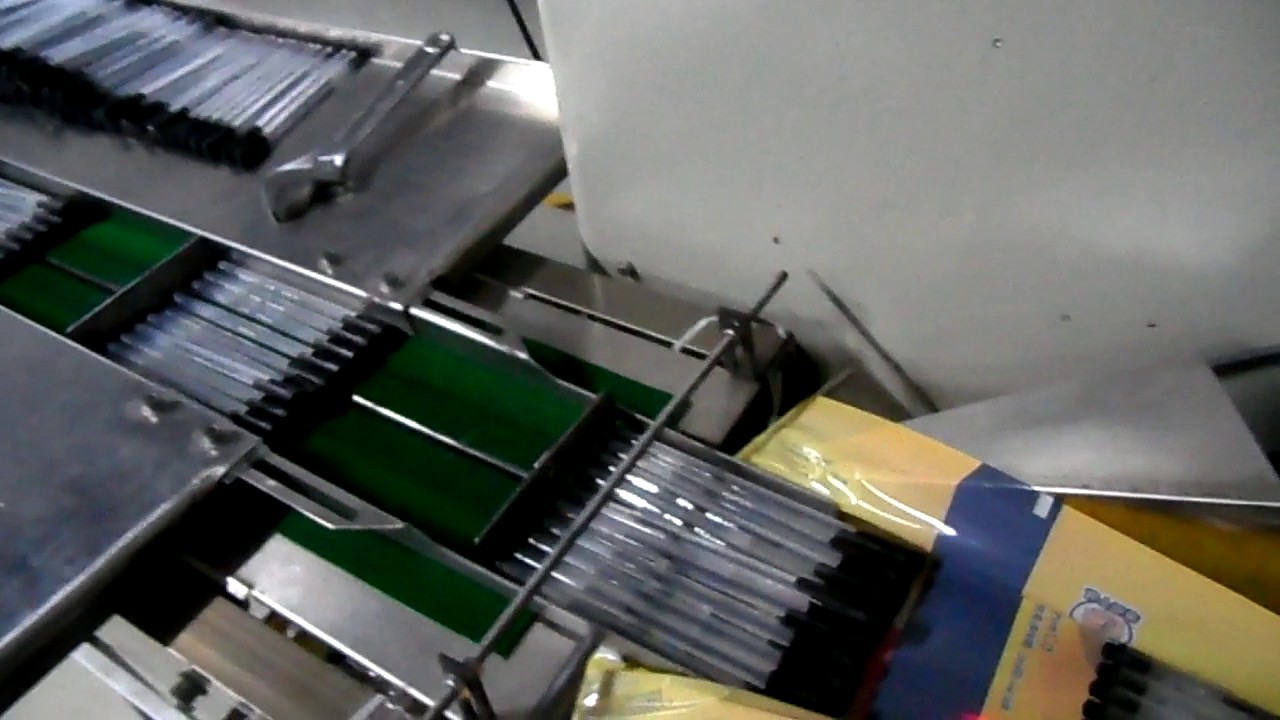 Ball-pen packing machine - YouTube