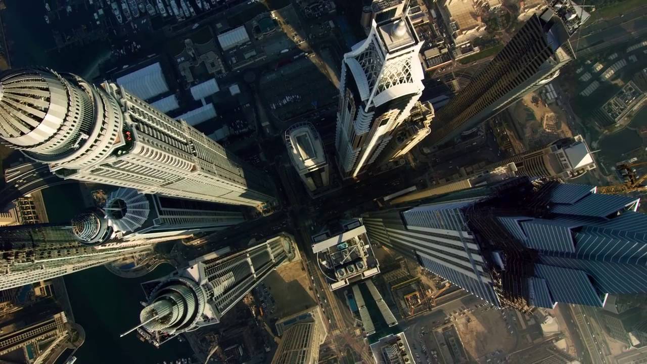 Amazing wing suit flying between Dubai marina towers - YouTube