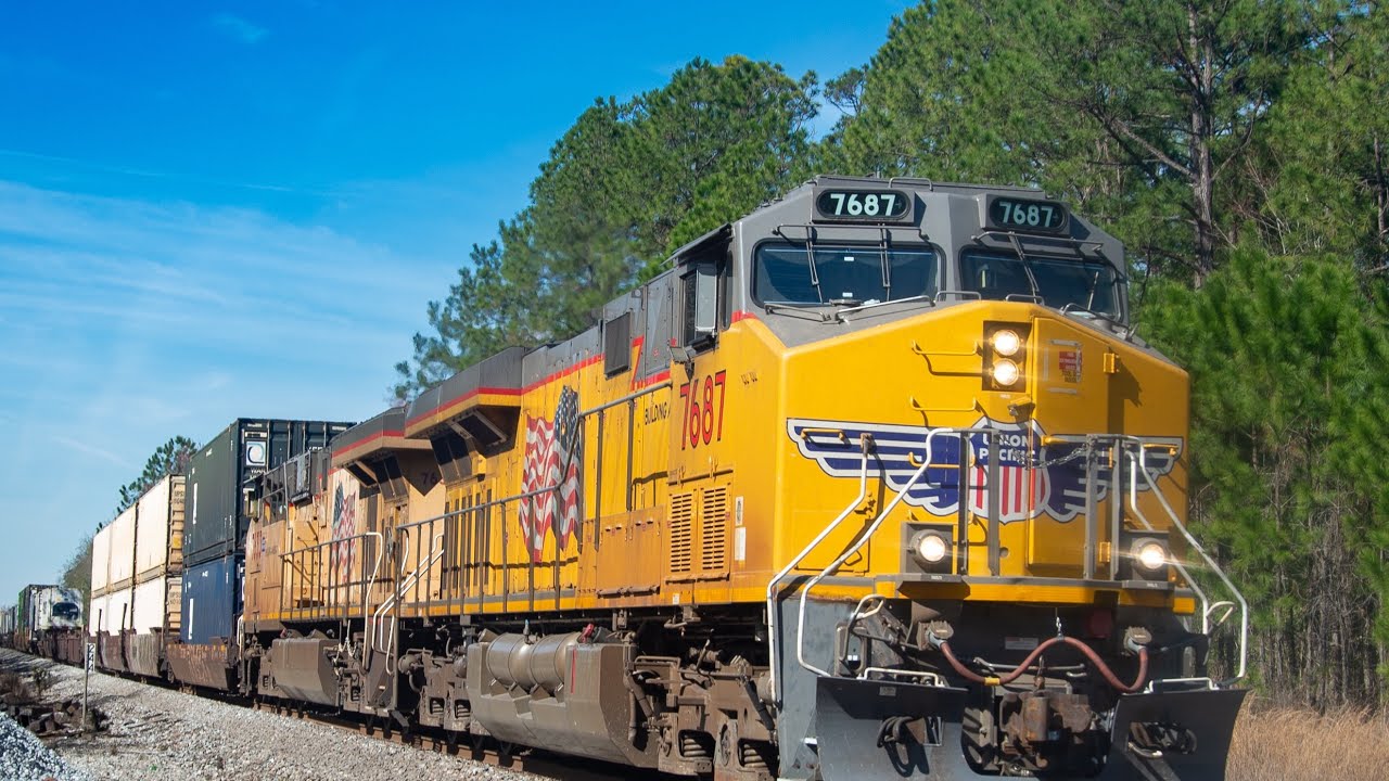 A pair of UP engines lead a NS train, crew change on Csx local.#csx # ...