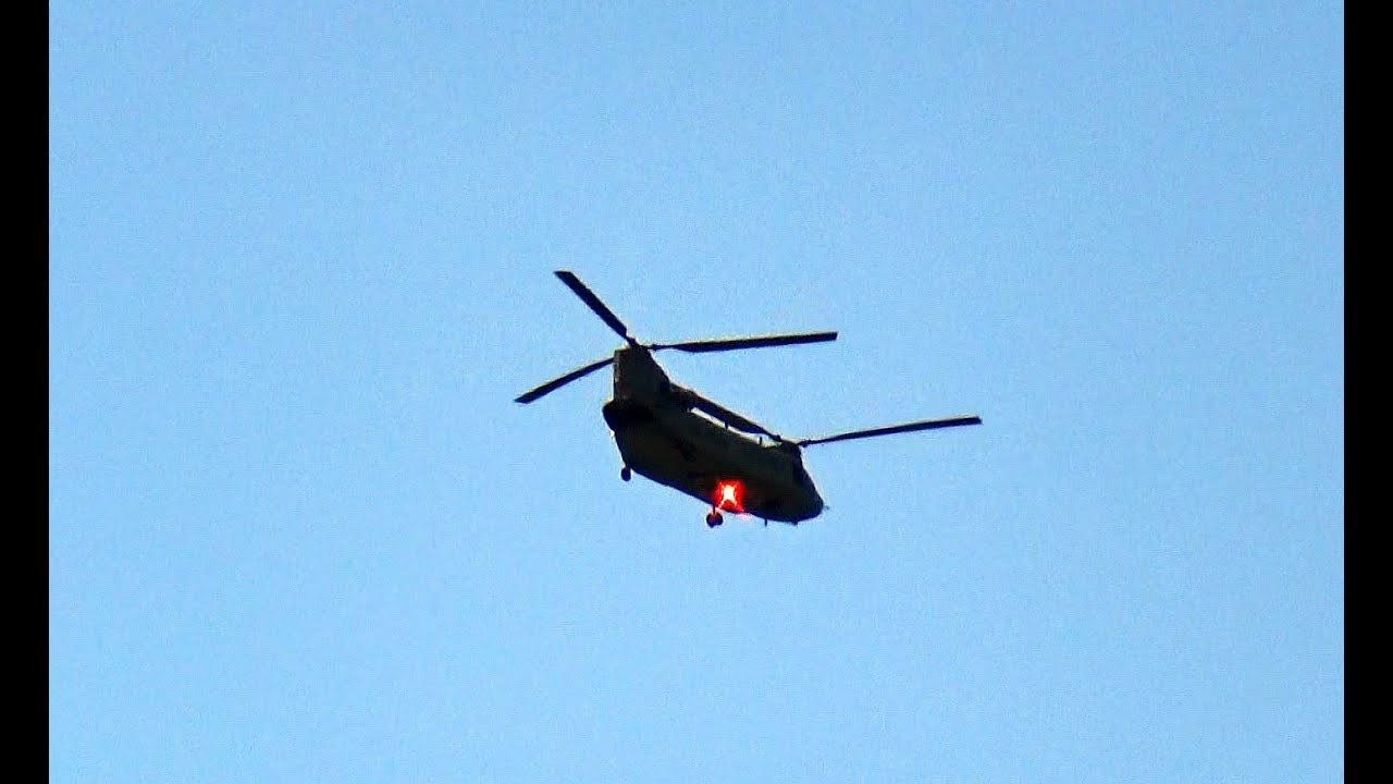 Boeing CH-46 Chinook heavy-lift helicopter flies over the Columbia ...