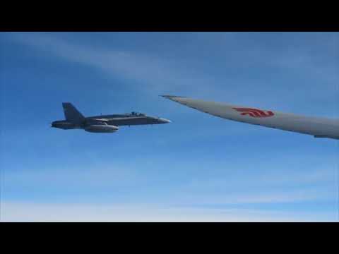 Exclusive video: Xi arrives in Madrid for state visit, escorted by Spanish warplanes