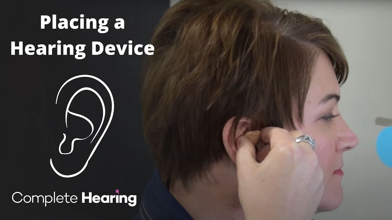 How to place a hearing device in the ear - YouTube
