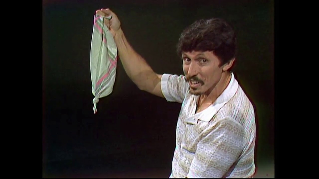 The magic knotting handkerchief trick - YouTube