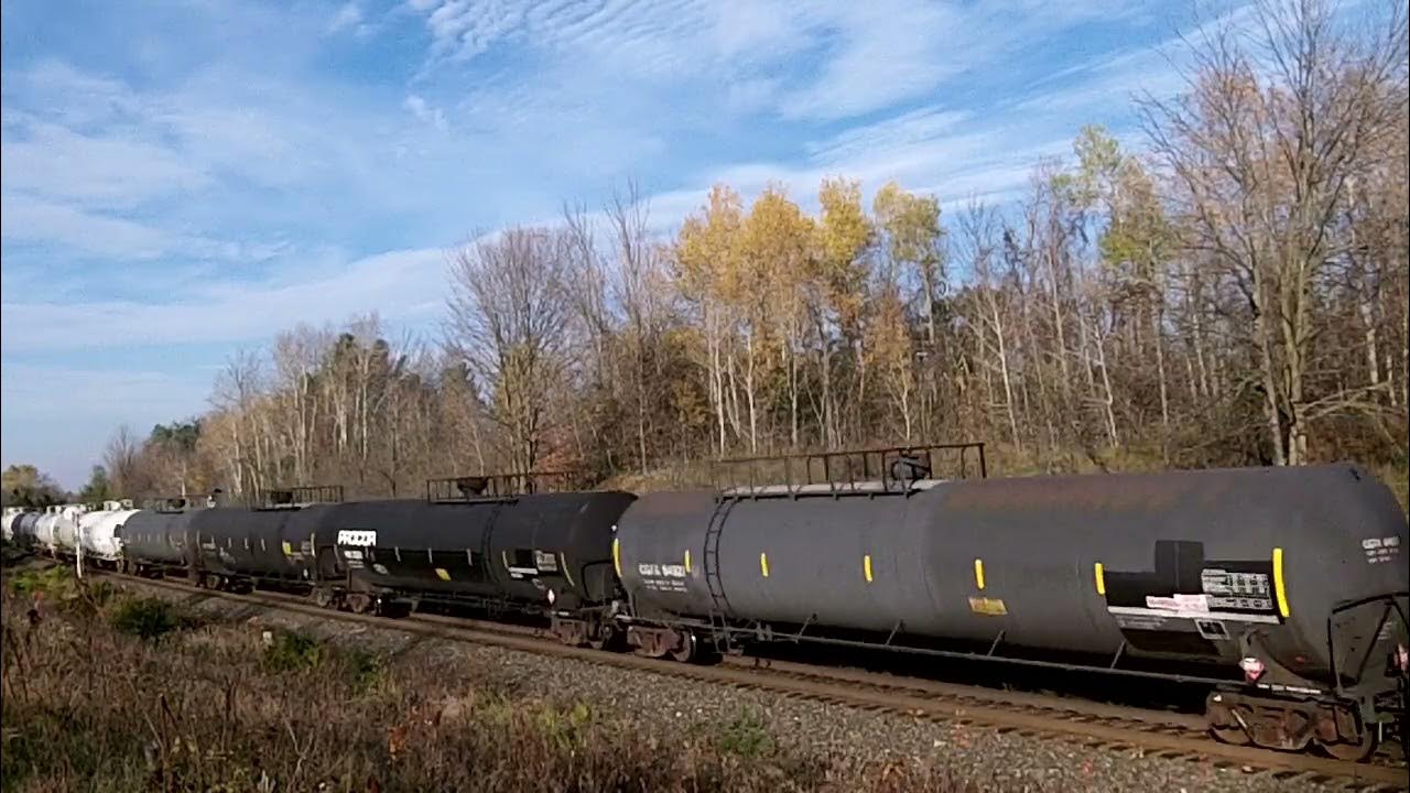 CN 435 w/ CN 5667 & BC Rail 4651 lead this long 600 axle, WB Autorack/Mixed Freight train by ...