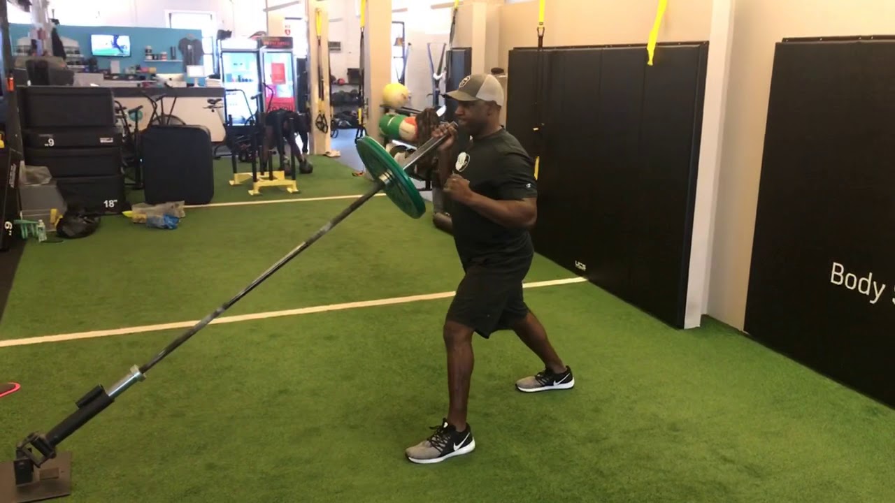 Landmine grappler split stance single arm press - YouTube