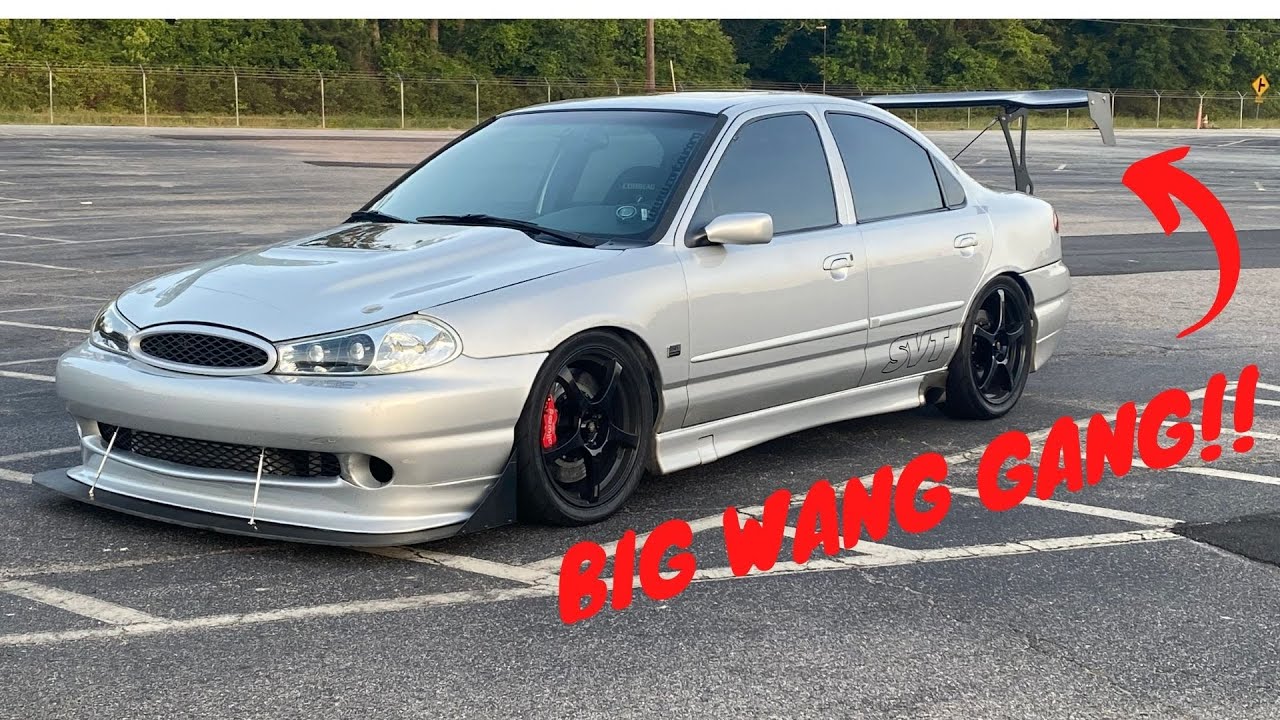 SVT Contour Chassis Mount Wing Install - YouTube