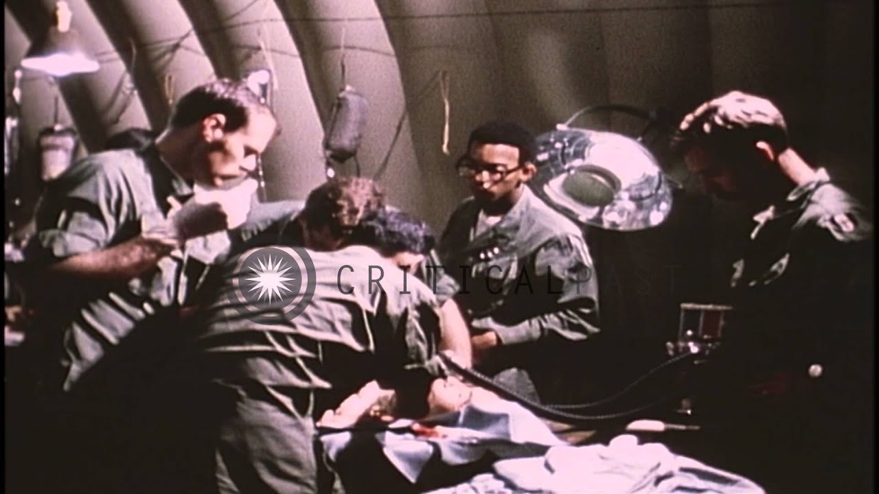 Doctors operate on a severely wounded United States soldier. HD Stock ...