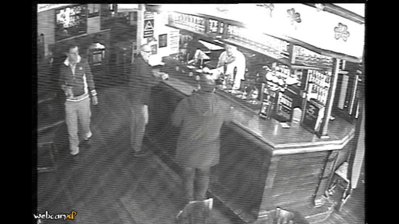 CCTV footage of a man walking into a bar in England. Drunk men in a bar ...