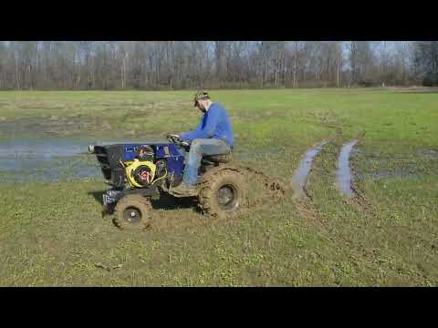 1974 diesel powered sears suburban mud mower ripping through gumbo mud ...
