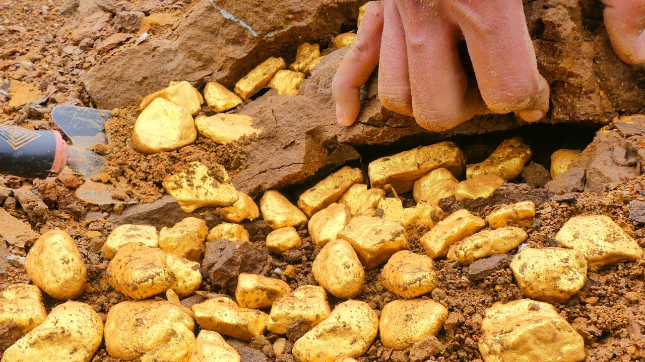 Mining gold expert ,Finding and digging gold under sone near riverside ...