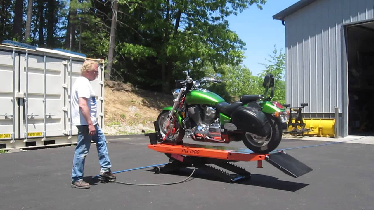 PRO 1200 RAISING AND LOWERING 734 lb MOTORCYCLE - YouTube