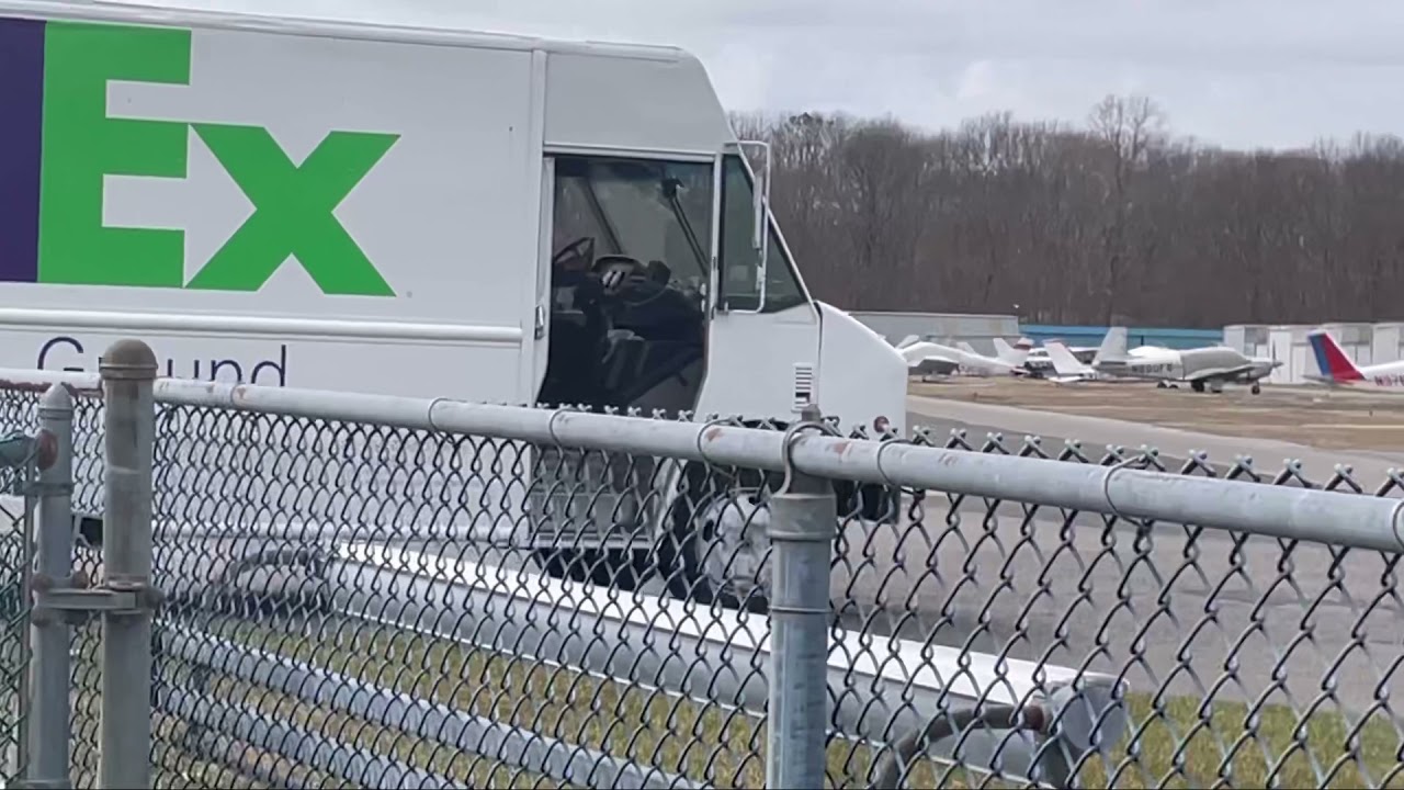 A FedEx Ground Step Van arrives at the airport - YouTube