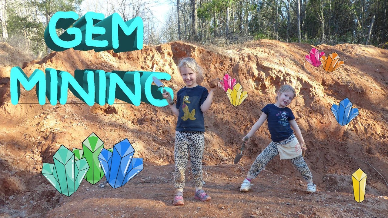KIDS GEM MINING shovels buckets and lots of dirts trying to find gems ...