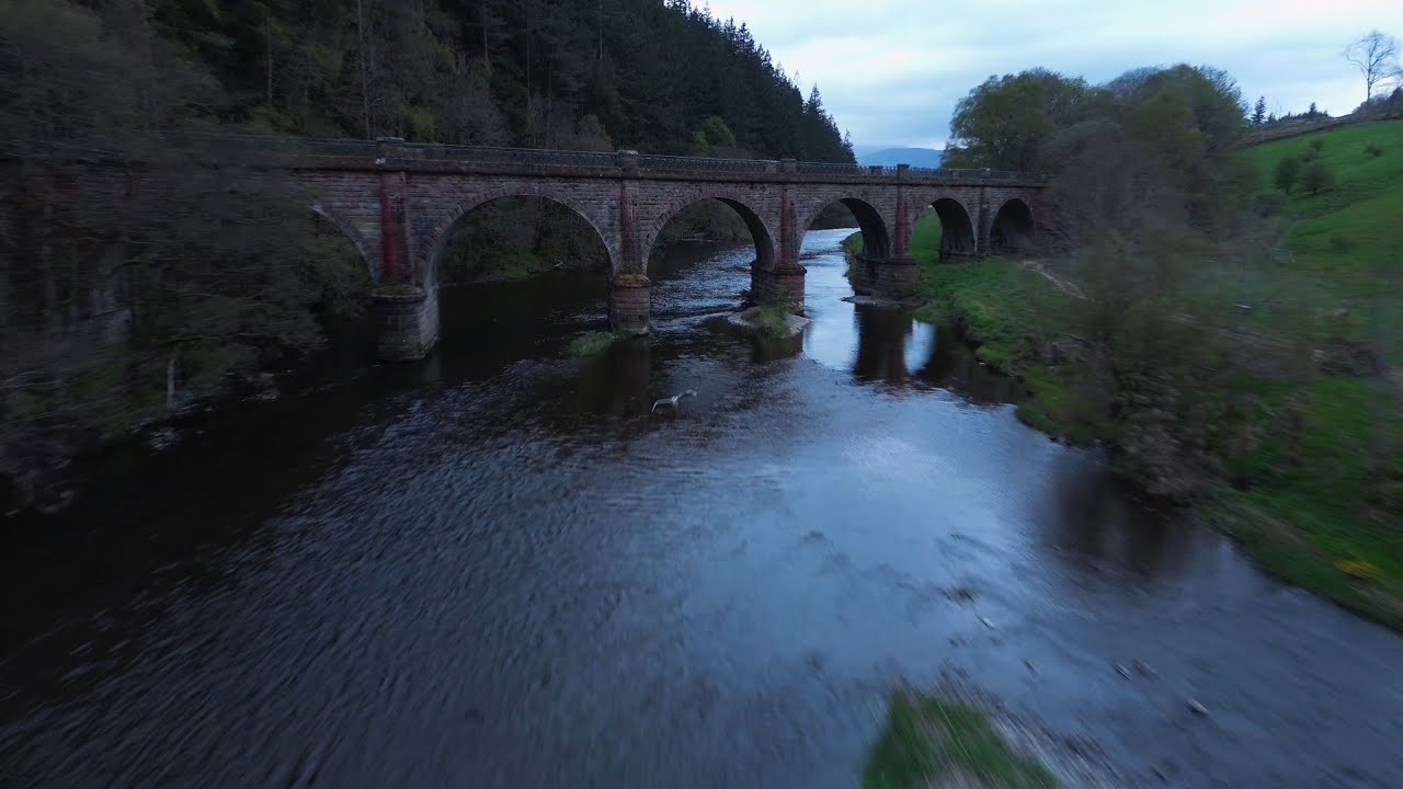 a flight up the river from Neidpath Bridge to the Manor bridge - YouTube