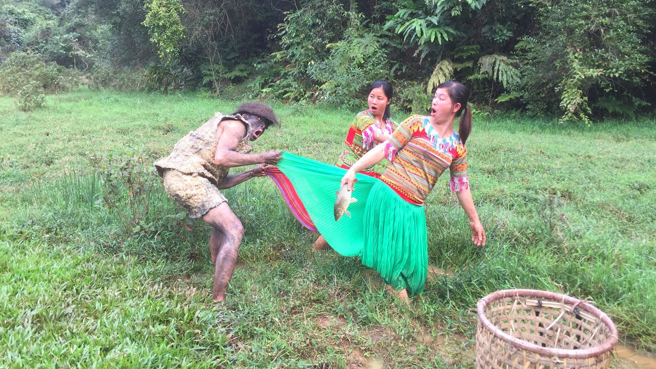 Primitive Life -Two Ethnic Girls Catching Fish In The Abandoned Swamp ...