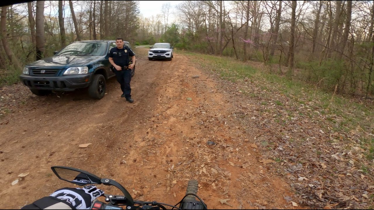 First Surron Vid | Offroading in the neighborhood | Friendly cop ...