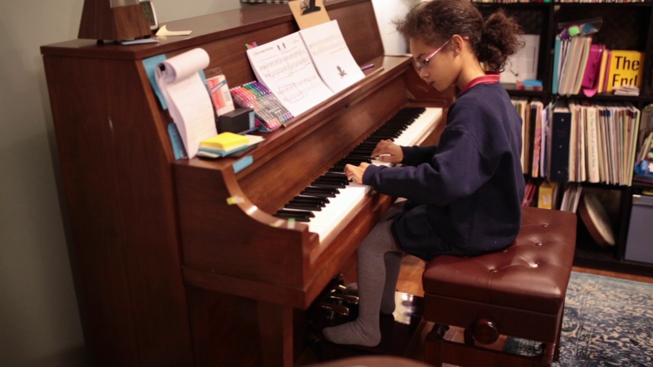 Maya plays "Rain Forest Mystery" (Piano Safari) - YouTube Music