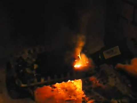 Lighting a coal fire with a heat gun - YouTube