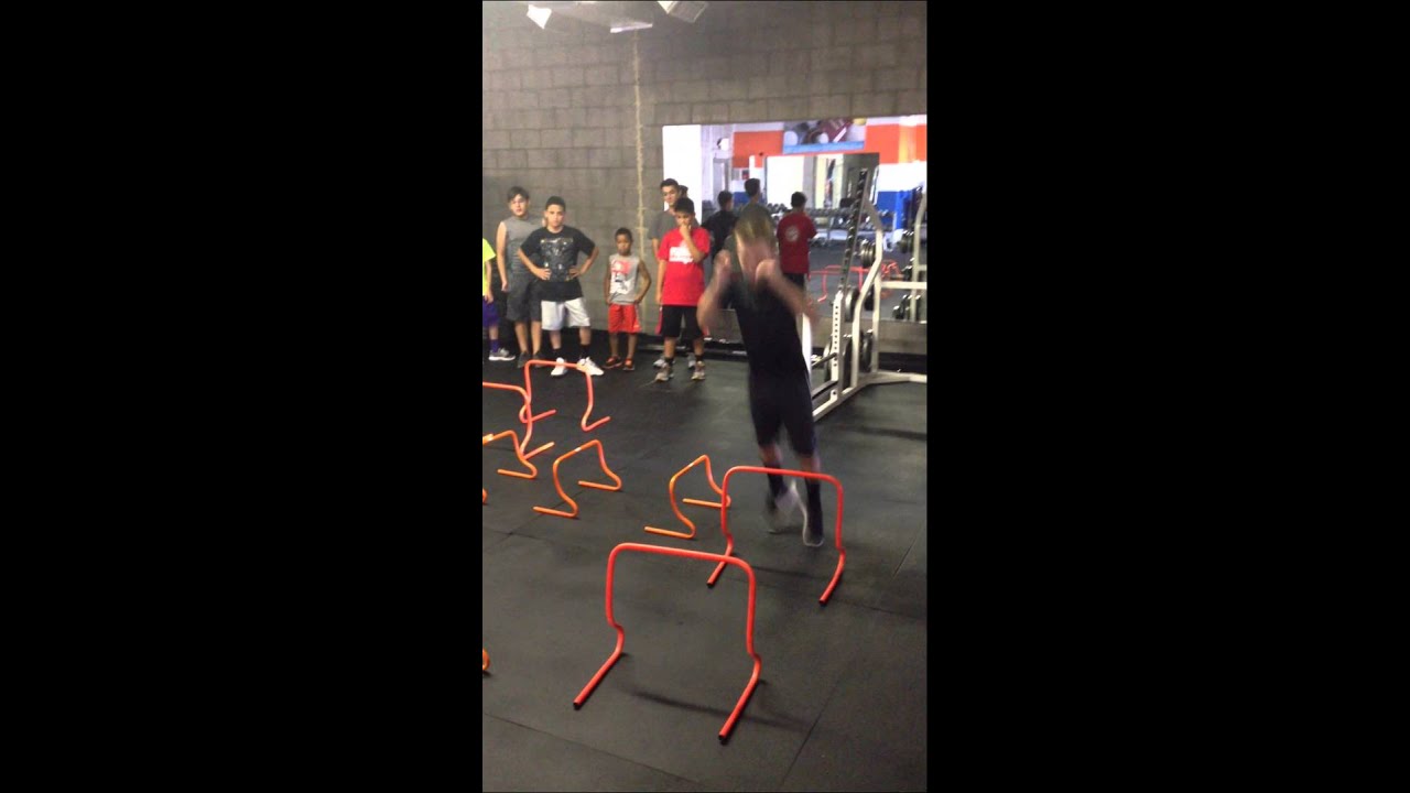 Agility hurdle work. Tuck jumps with lateral high knees ending with ...