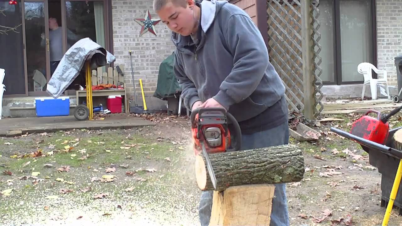 cutting wood with the husqvarna - YouTube