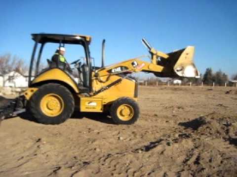 heozamora Skip Loader Grader 414E CAT - YouTube