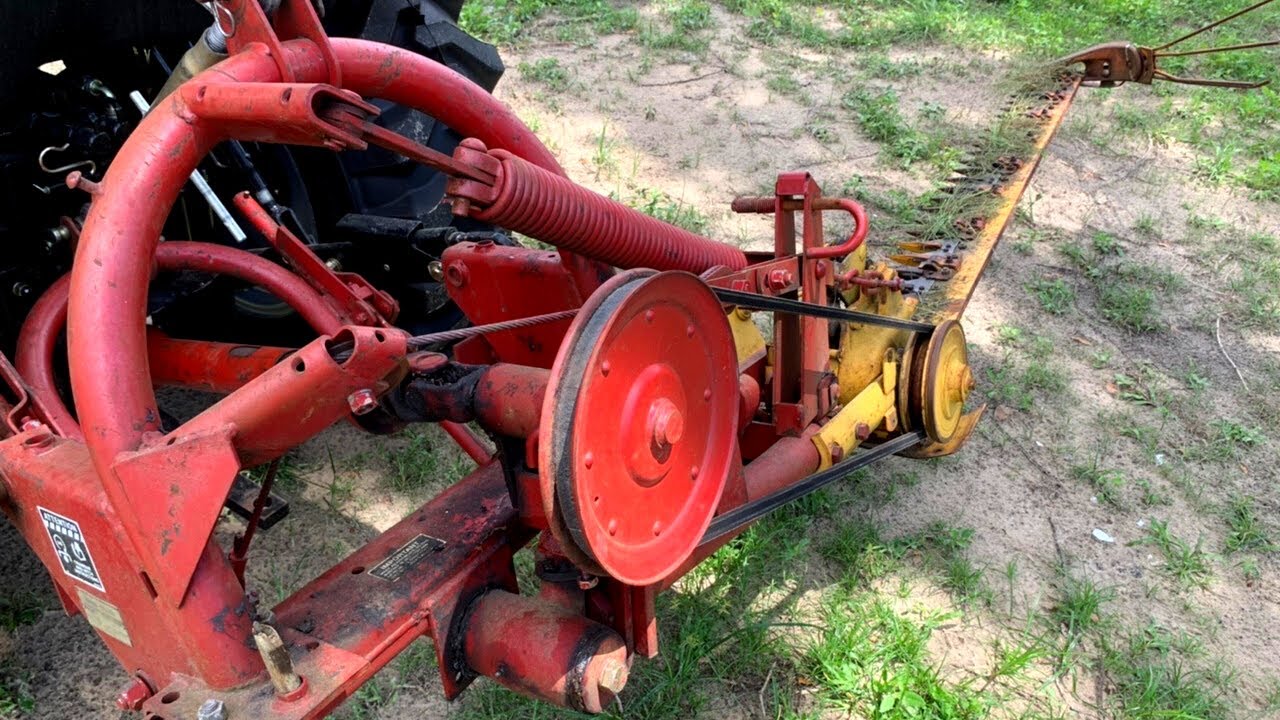 How to adjust the drive belt on a sickle bar mower in less than 5 ...