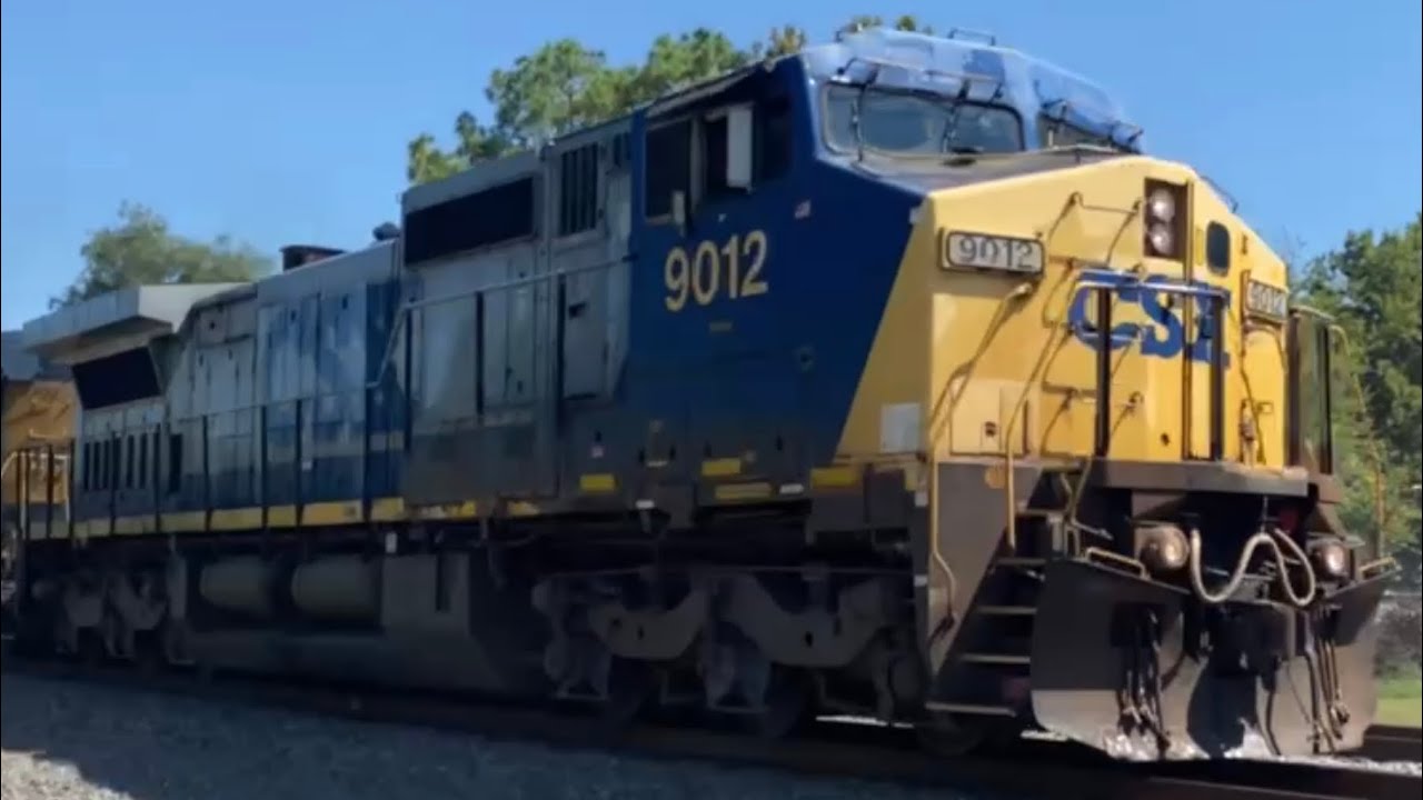 CSX C40-9w 9012 leads a Train through Humphrey Arkansas! with a K5hl ...