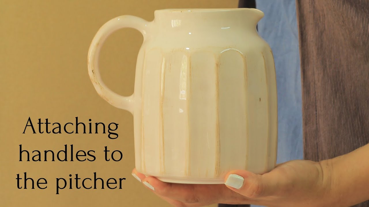 Attaching handles to the pitcher . #handmade #ceramic #pottery #pitcher ...