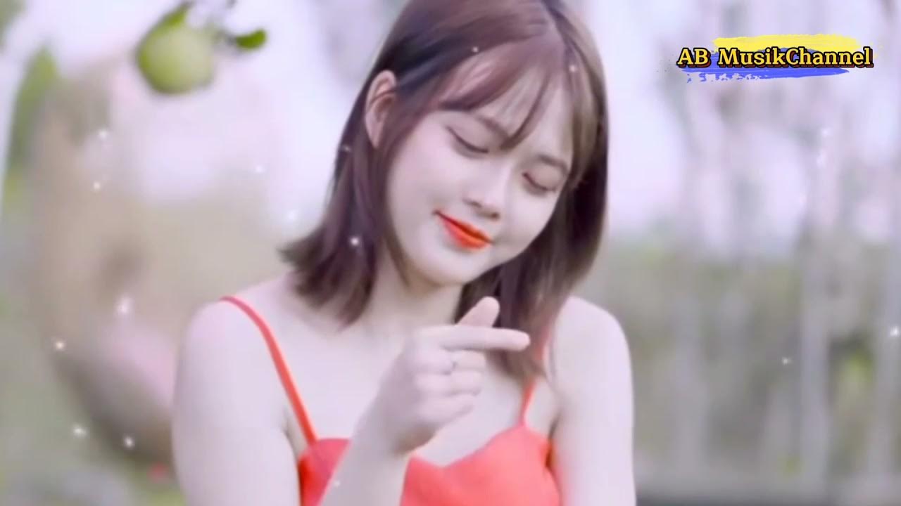 回忆曾经放过谁 hui yi ceng jing fang guo shei / terjemahan indo/pinyih - YouTube Music