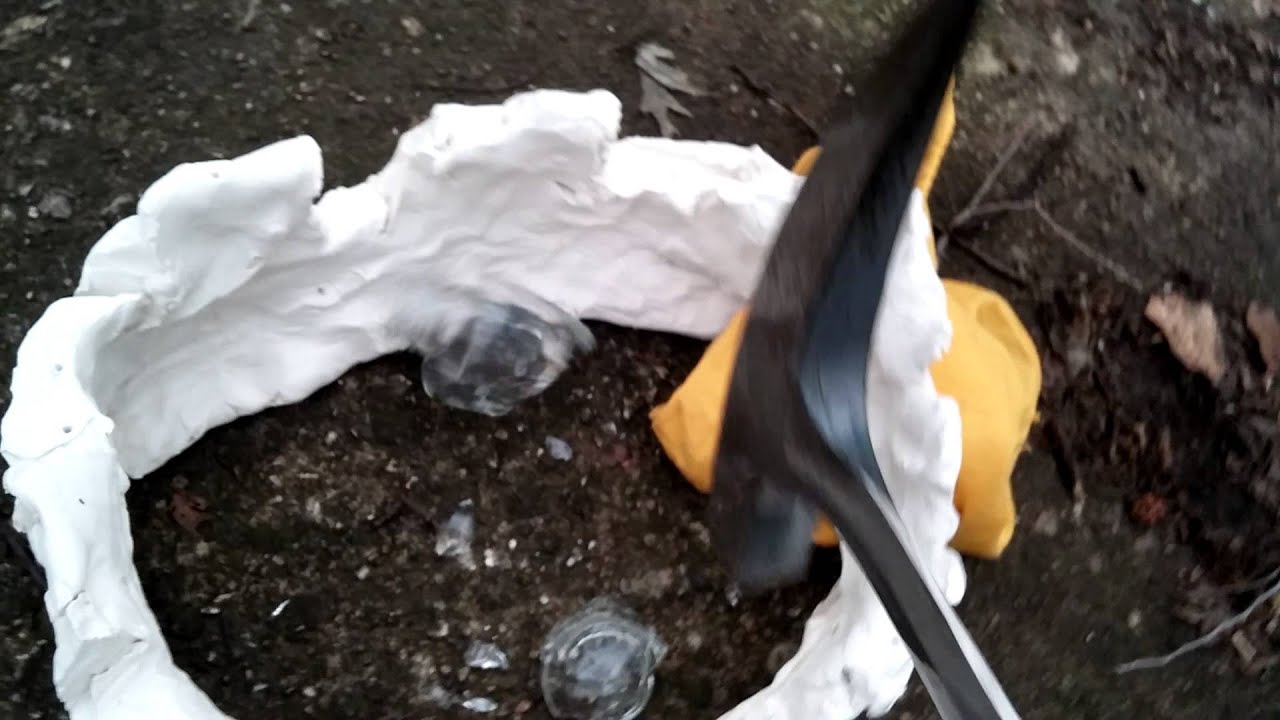 Shattering Glass with Geological Pick - YouTube