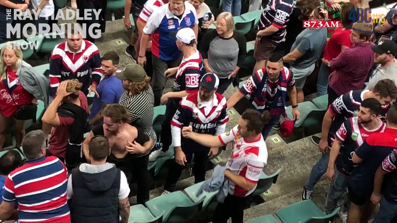 Fans brawl at NRL Anzac Day game - YouTube