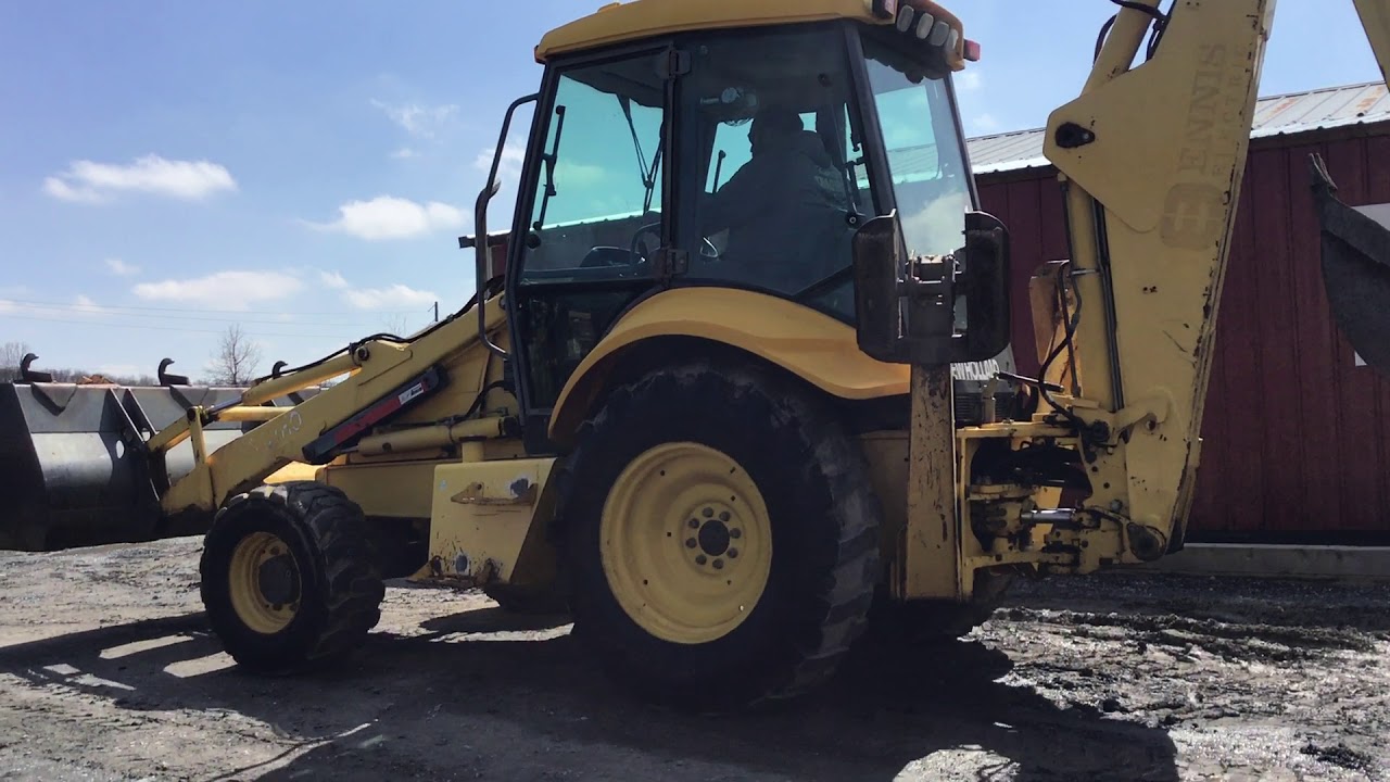 NEW HOLLAND LB110 BACKHOE - YouTube