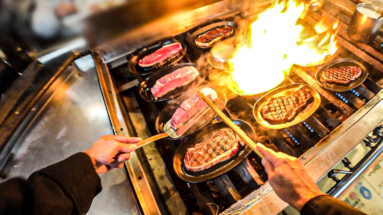 POV: Steak Chef Grilling Steak On a Hot Iron Plate - YouTube