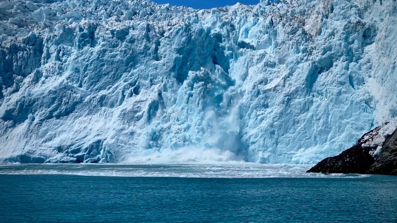 HUGE ice chunk falls off of 500 Ft. tall Glacier - YouTube