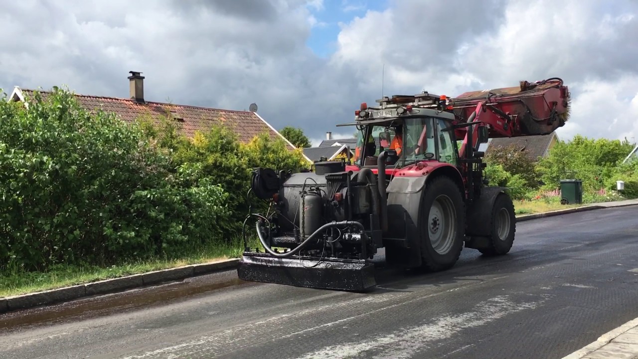 Tack coat sprayer prepares for new wearing course asphalt ABS11 layer ...