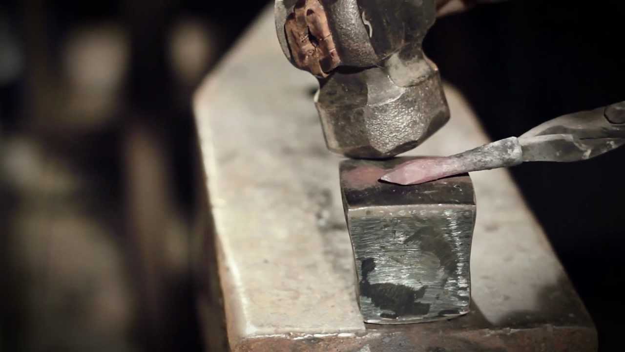 forging a european arrow head - YouTube