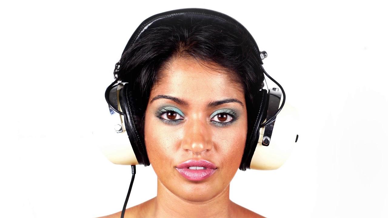 Interesting shot of changing retro headphones on a woman's head - Disco ...