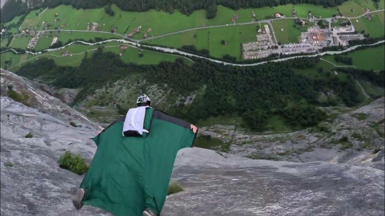 Flying through a Waterfall / Wingsuit Base Jump / Switzerland - YouTube