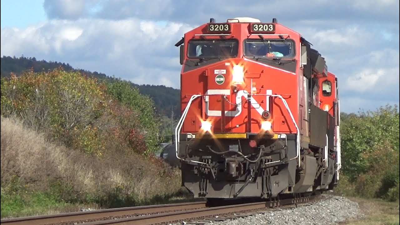 Orange Flag! Short Freight Train CN 594 West passing thru Penobsquis ...