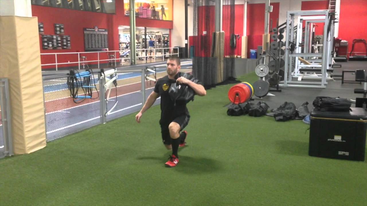Offset Walking Sandbag Lunges - YouTube