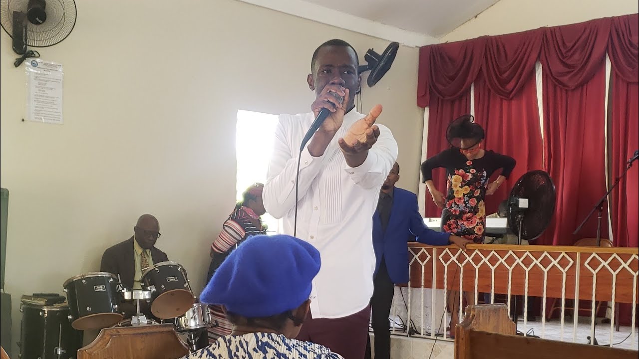 Minister Giovanni Hamilton preaching at Bethel United Church of Jesus ...