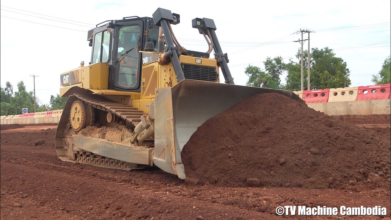 Heavy CAT D6R2 Bulldozer Pushing Red Gravel For Building Road ...