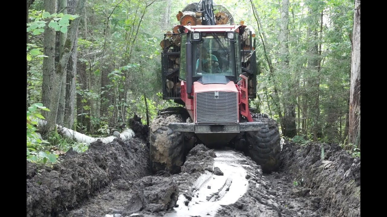 Logging with Valmet 840.3, difficult road - YouTube